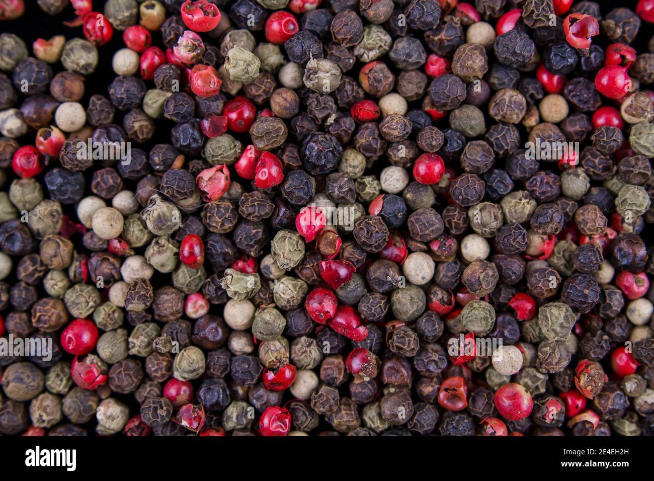 Mixture different peppercorns white hi-res stock photography and images ...
