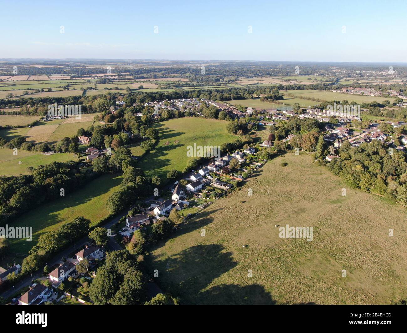 aerial view of linear housing along a road in a rural setting Stock ...