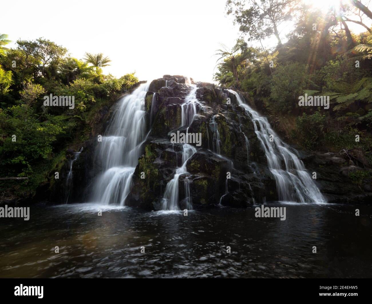Panorama view of tropical staircase waterfall cascade river Owharoa ...
