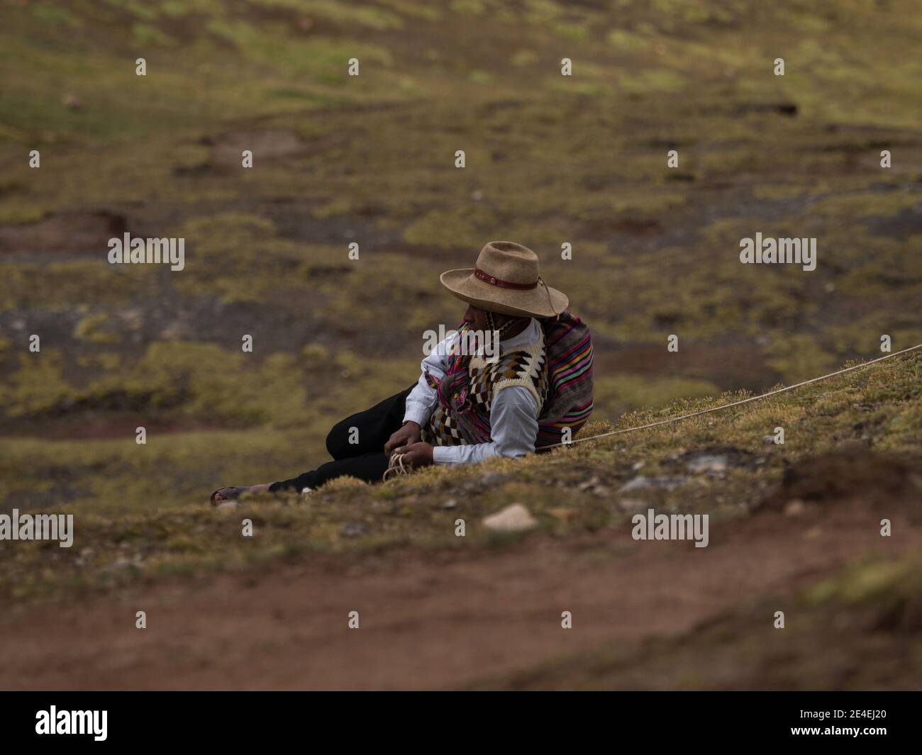 Peruvian man in traditional andean indigenous clothes at Cordillera de ...