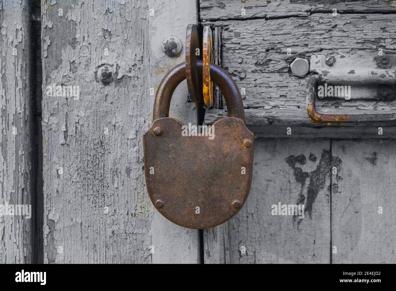 Old rusty Door lock on the door toned in ultimate gray color, close up ...