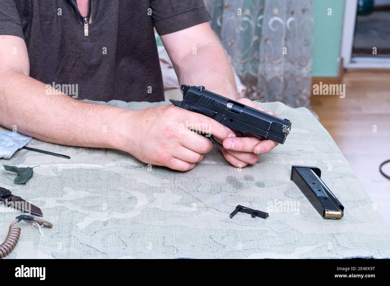 Pistol in hand hi-res stock photography and images - Alamy
