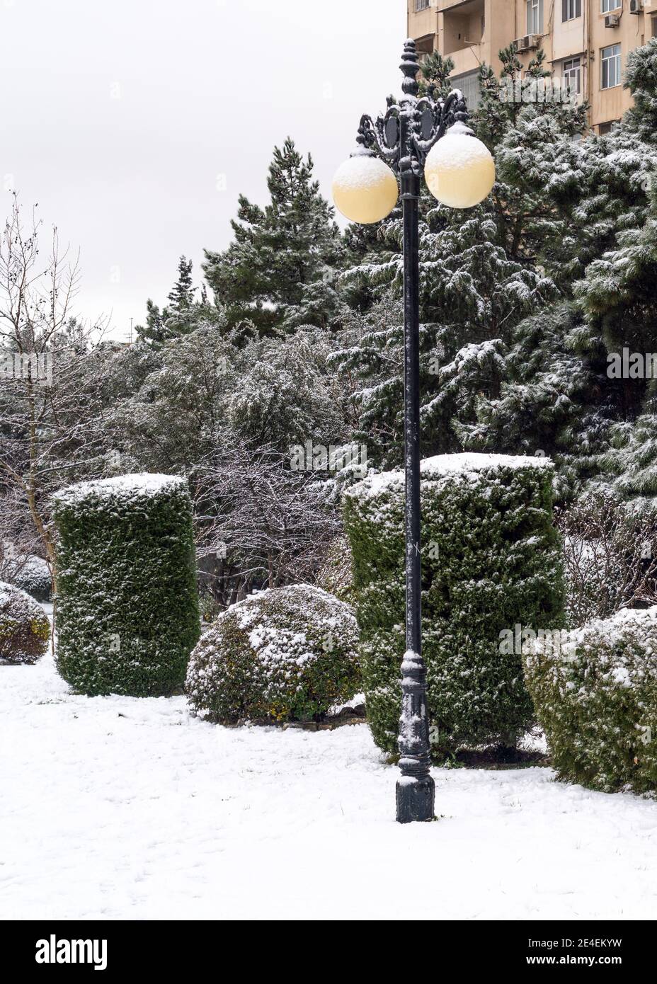 Street lamp covered with snow Stock Photo - Alamy