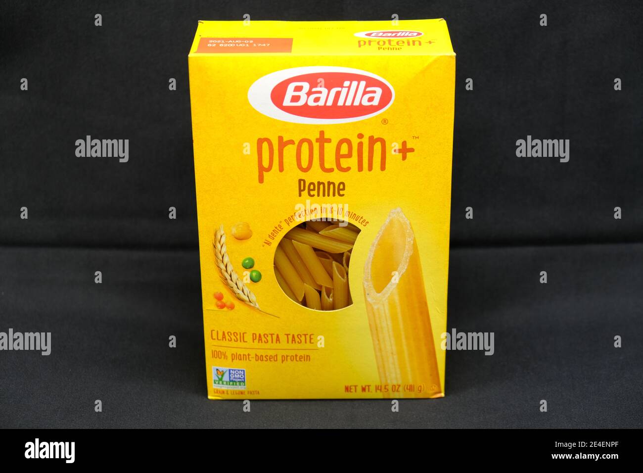 This is a stock photograph of Barilla Protein Penne Pasta on a black ...