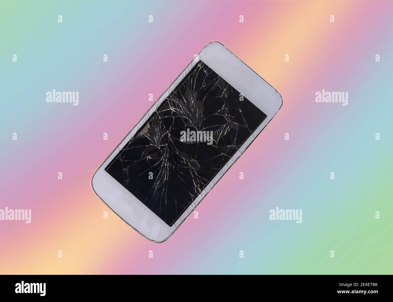 Broken mobile phone with cracked display on neon background, flat lay ...