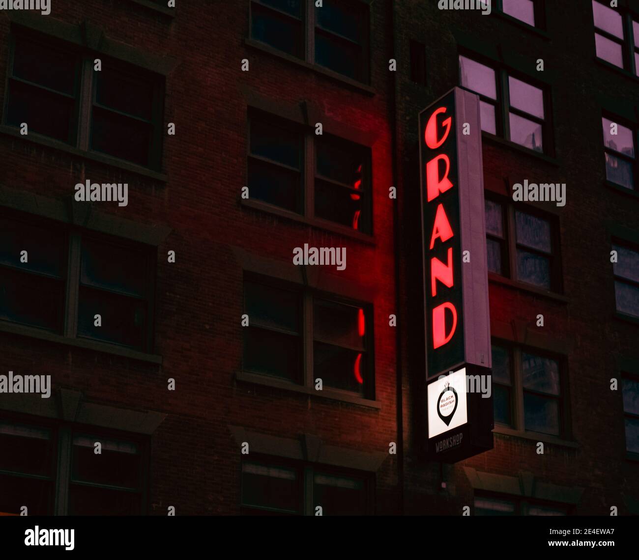 Beautiful illuminated hotel neon sign in the city's downtown Stock ...