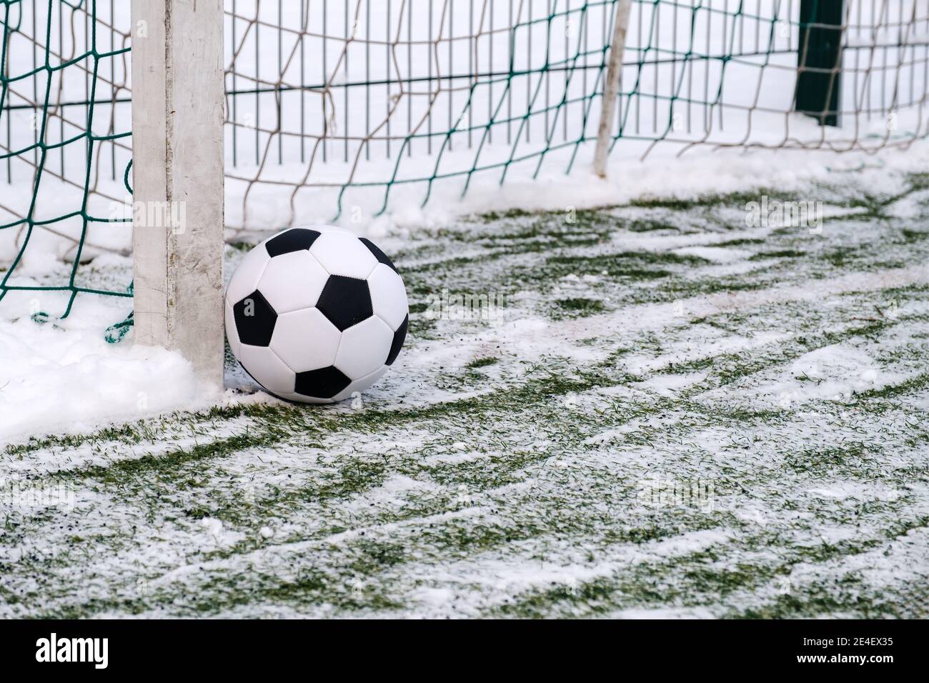 Soccer ball in snow hi-res stock photography and images - Alamy