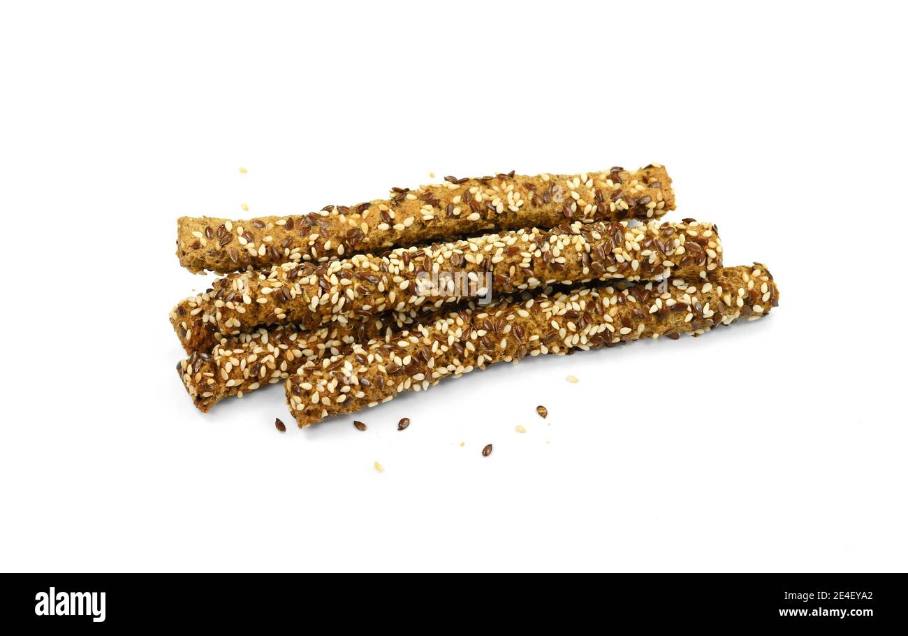Stick crackers. Sesame- linen stick crackers. Pretzel bread stick with ...