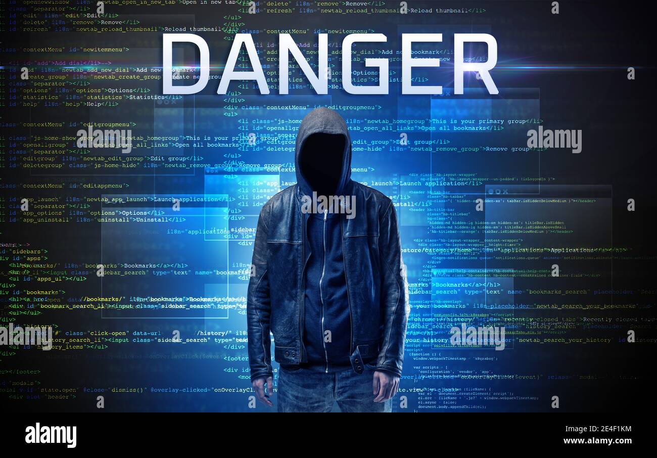 Faceless hacker with DANGER inscription on a binary code background ...