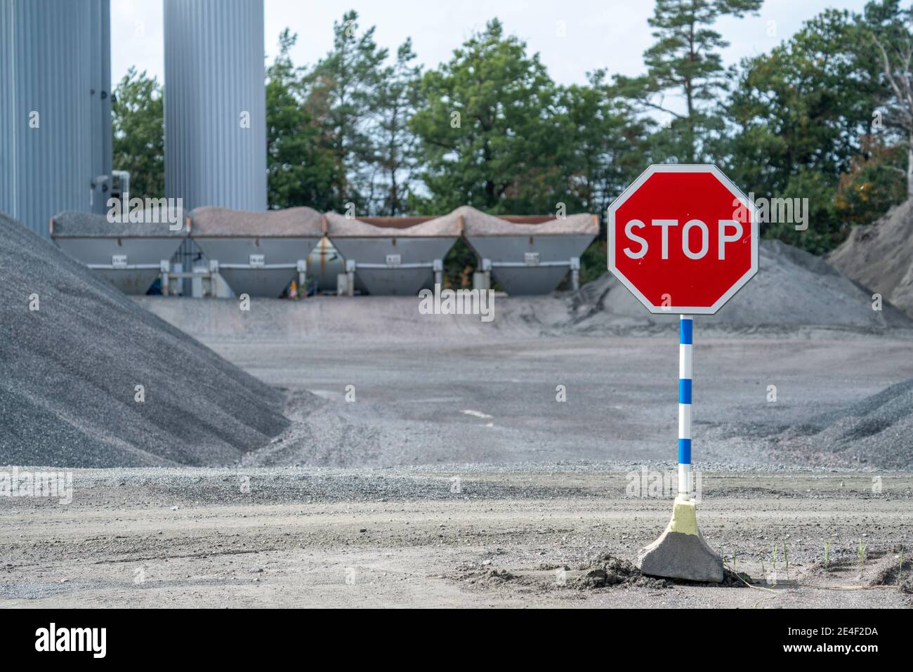 Red Stop Attention Warning Sign on pole in quarries and open diggings ...