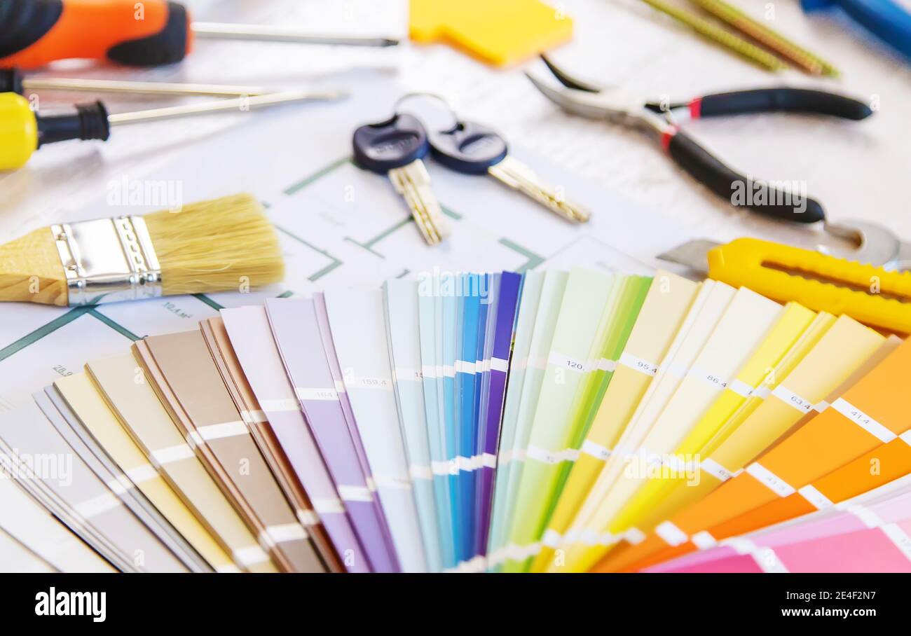 home improvement and renovation concept - construction tools and items ...