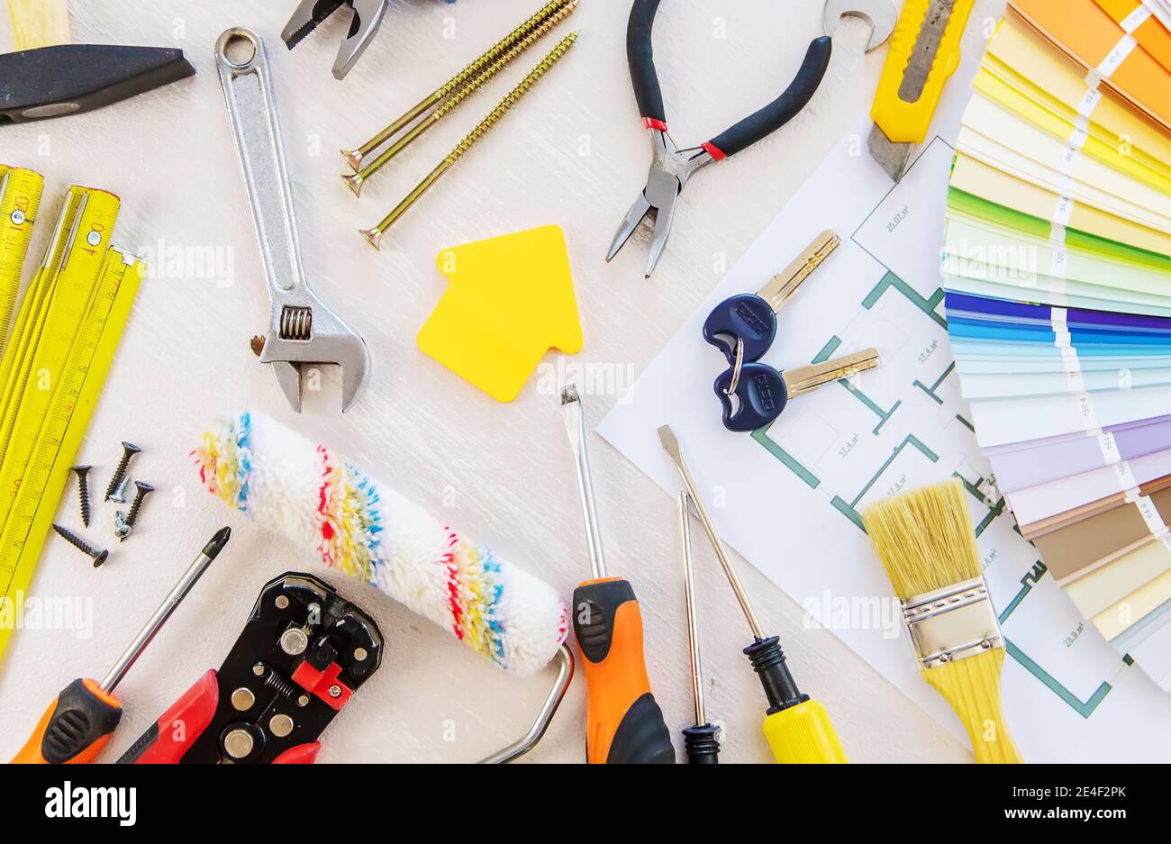 home improvement and renovation concept - construction tools and items ...