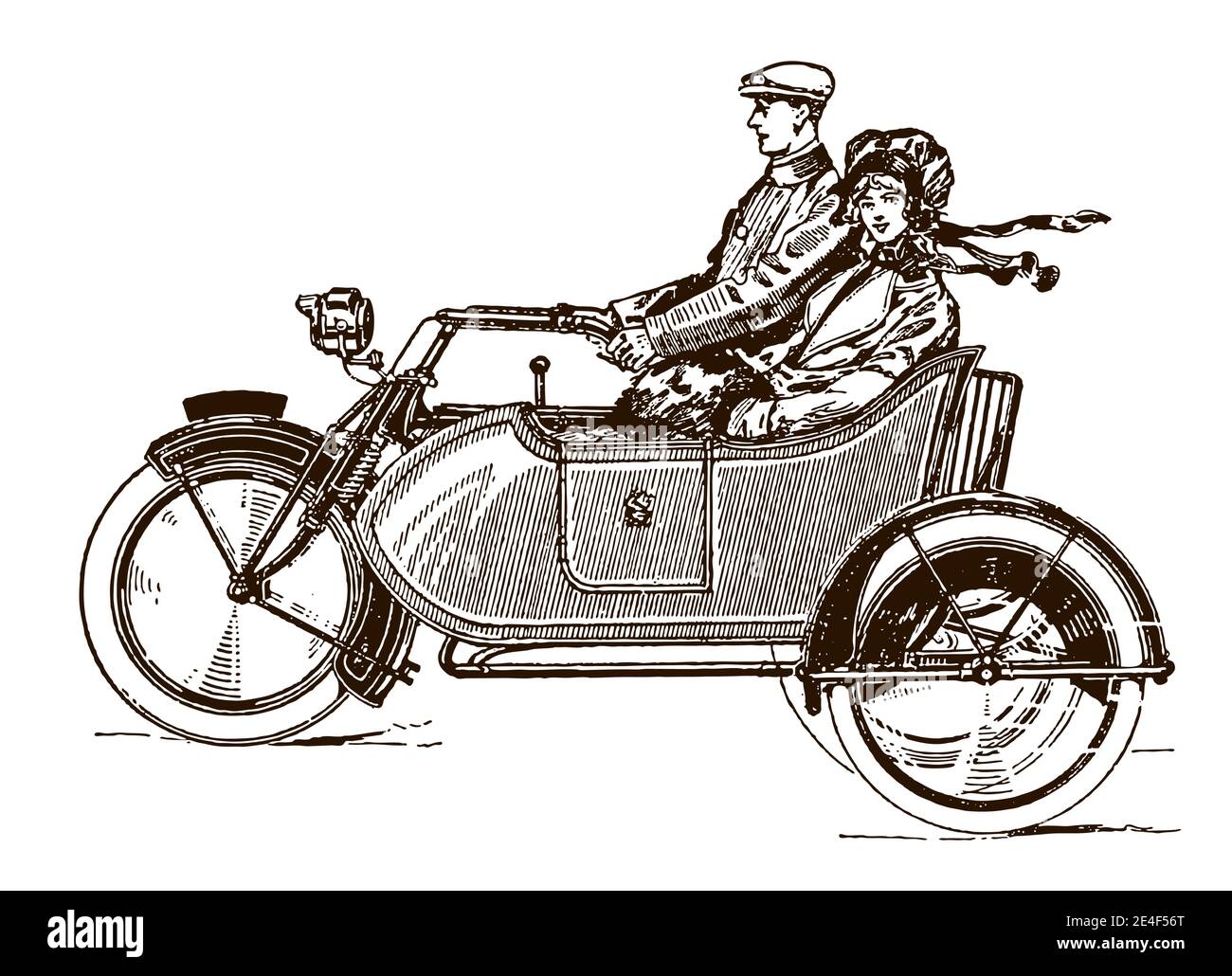 A Man and a woman from the early 20th century riding a classic ...