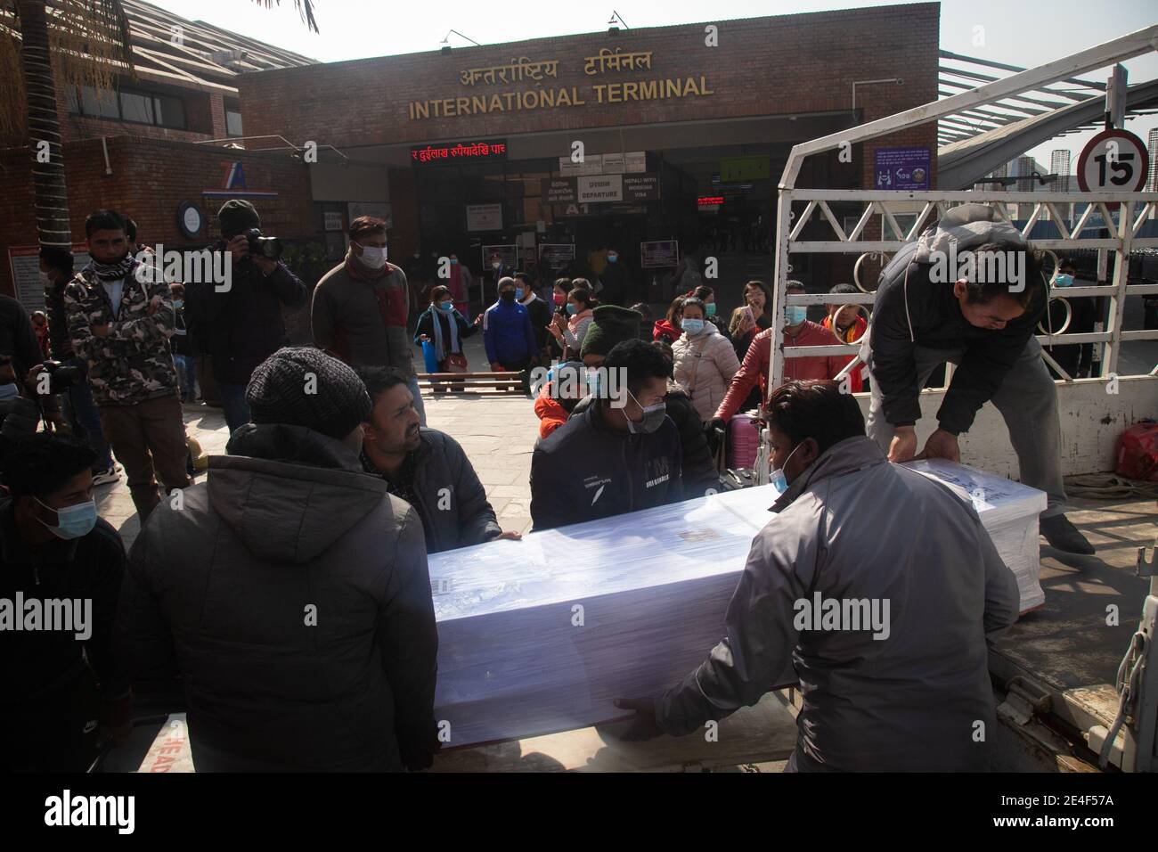 Coffin loading hi-res stock photography and images - Alamy