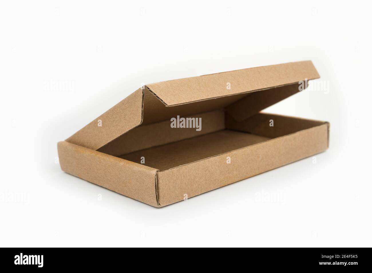 Small shallow paper box for jewelery or battery Stock Photo - Alamy