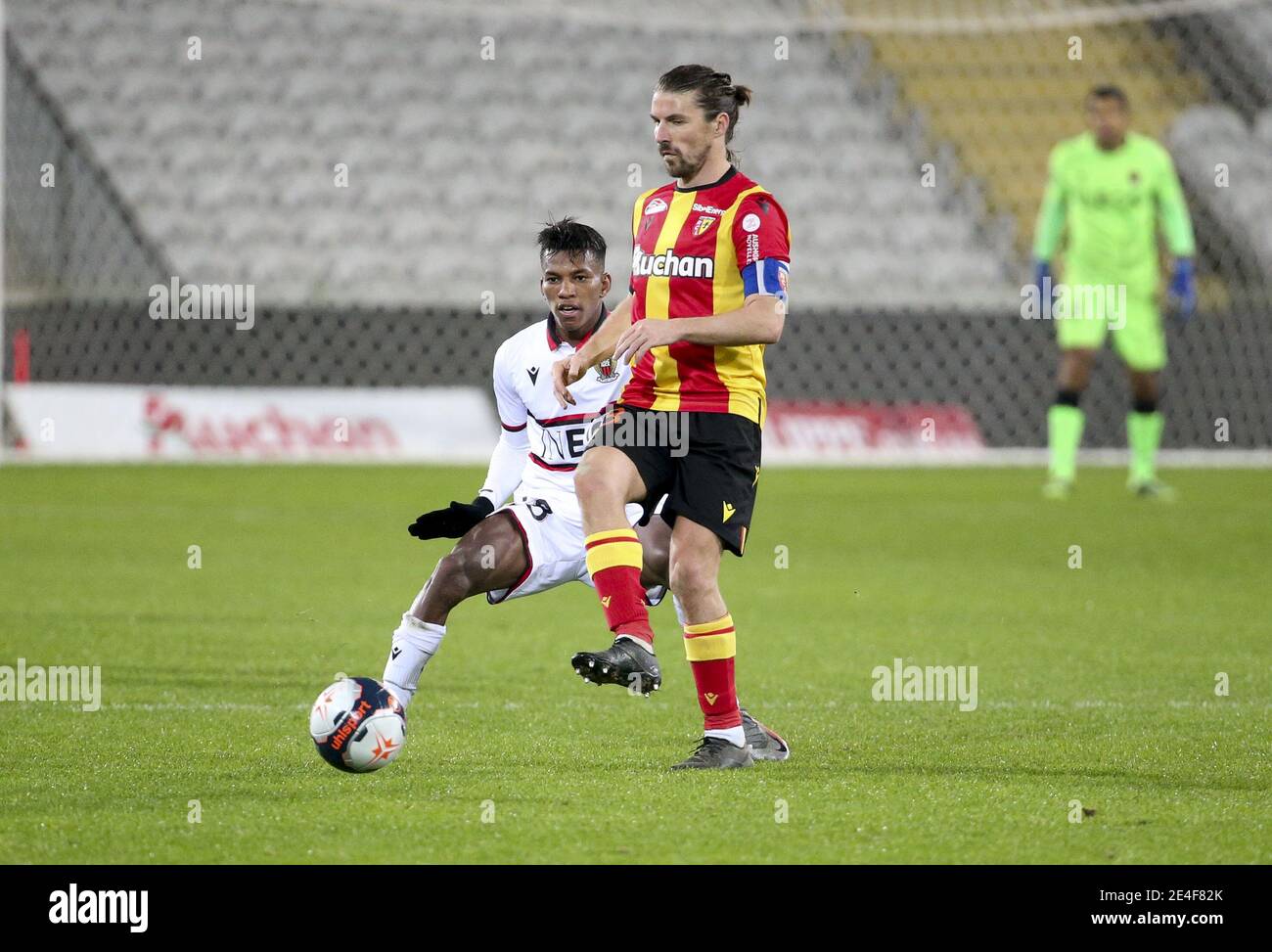 Yannick Cahuzac of Lens, William Saliba of Nice during the French ...