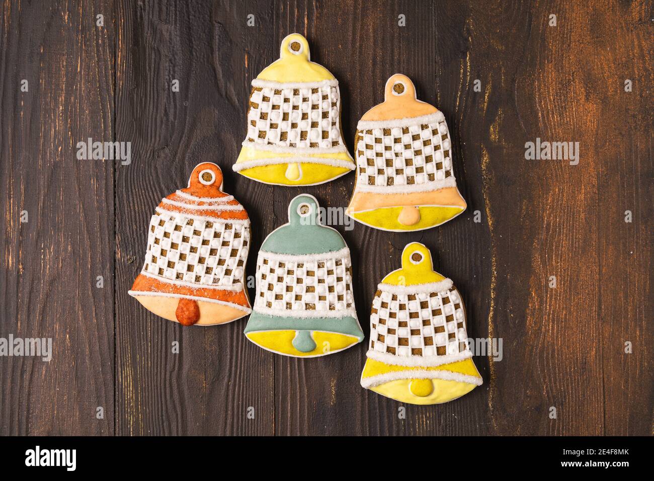 A festive Christmas and New Year's gingerbread in the shape of a bell ...
