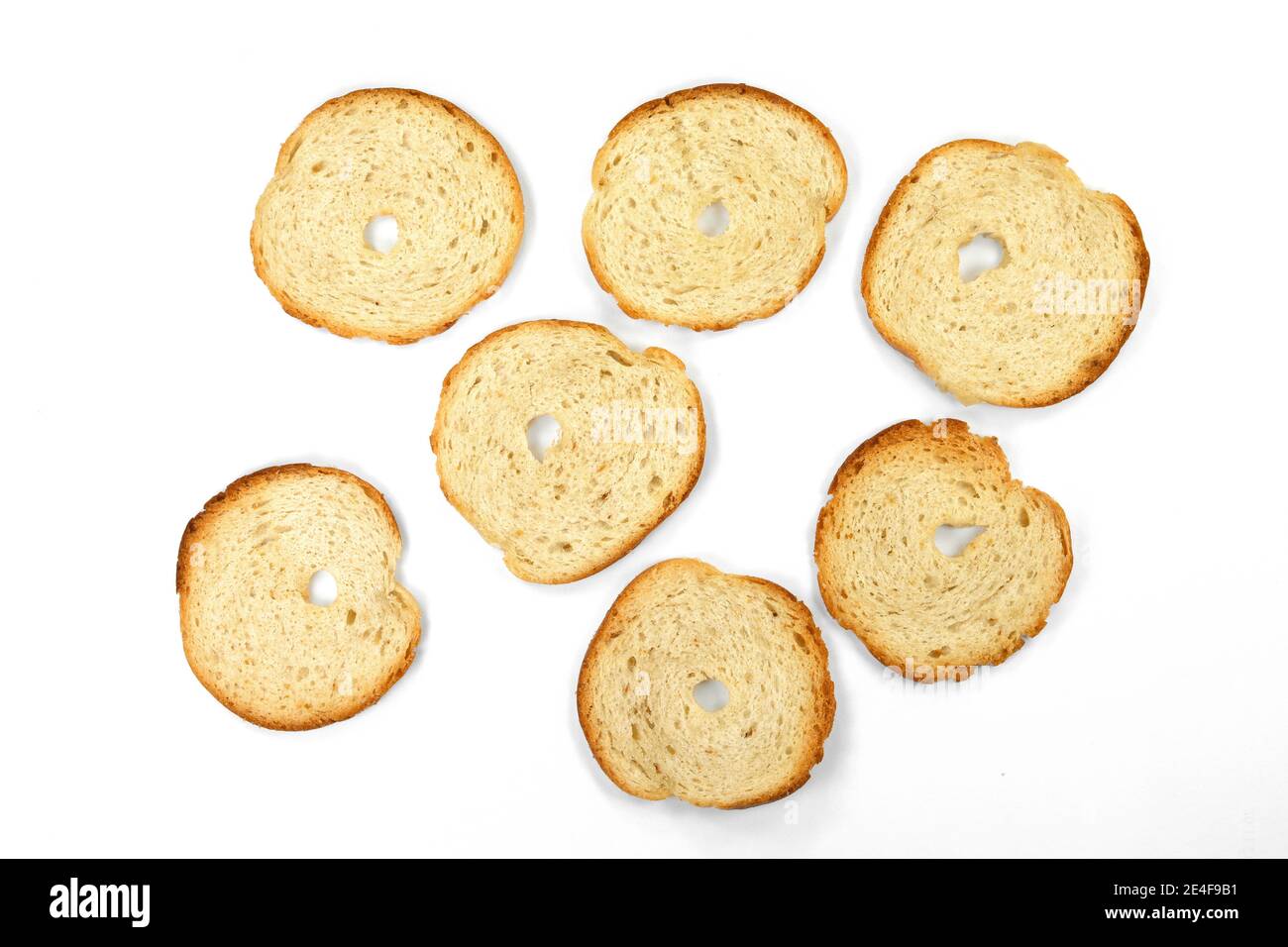 Bake rolls. Mini bread chips isolated on white background Stock Photo ...