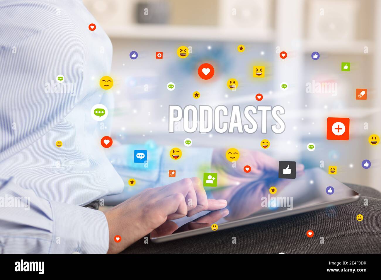 Close up of business person playing multimedia with social media icons ...