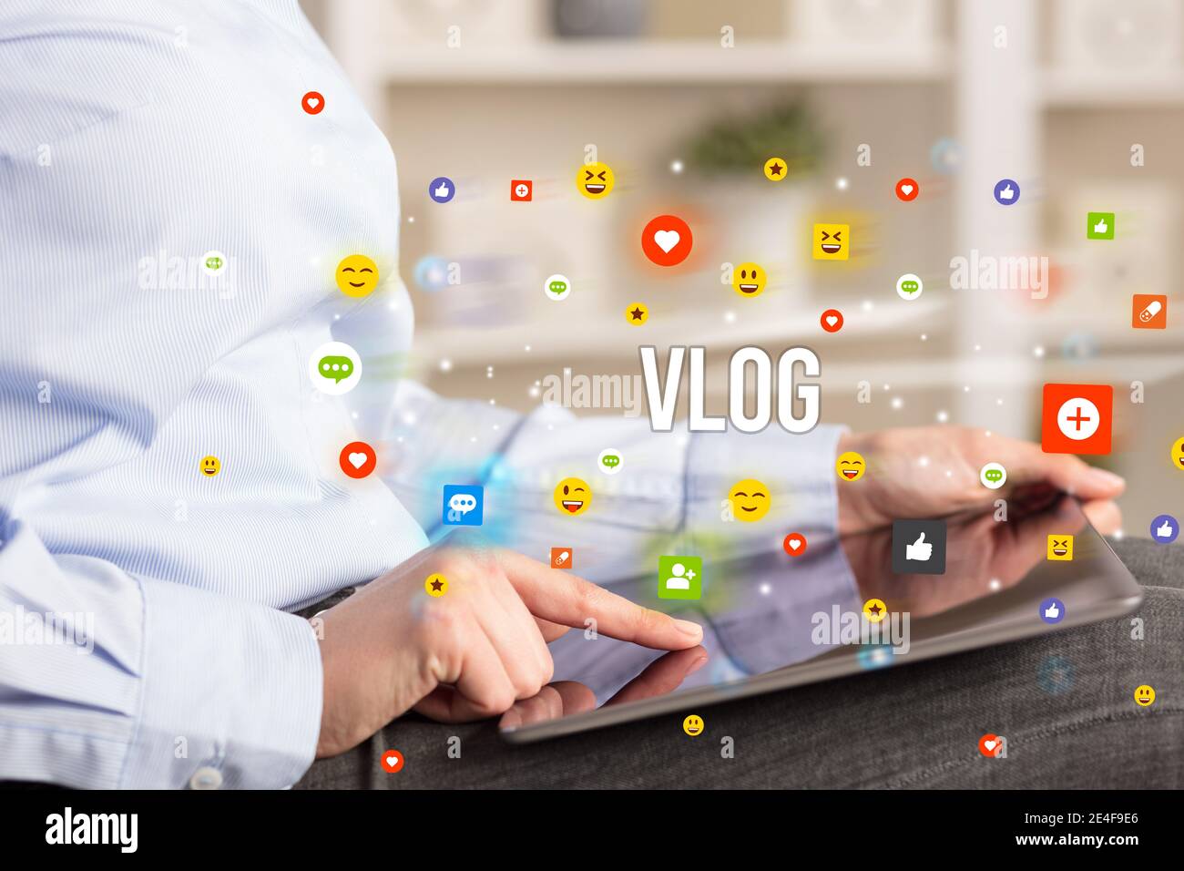 Close up of business person playing multimedia with social media icons ...