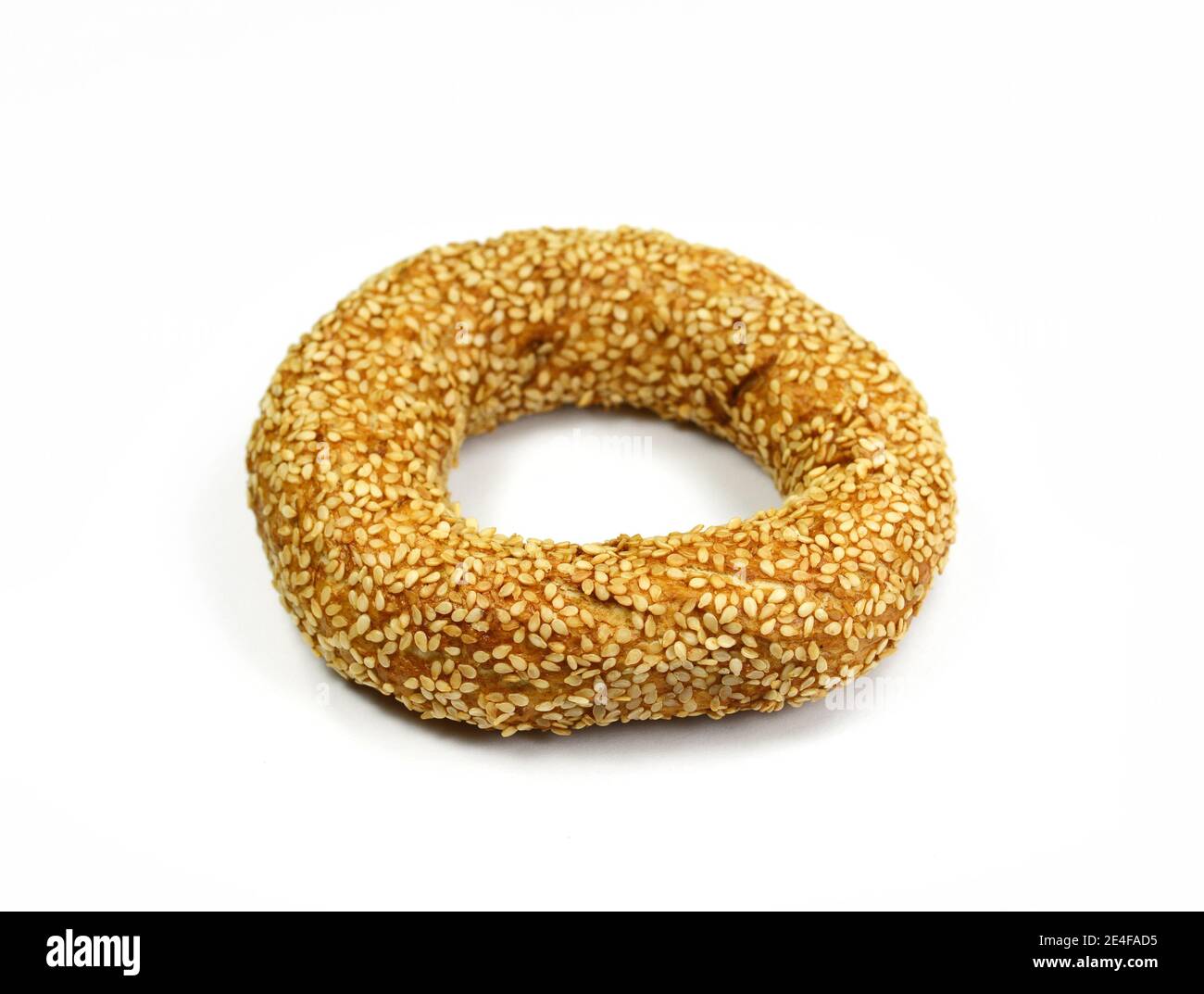 Fullgrain bagel with seeds isolated on white background. Fresh ...