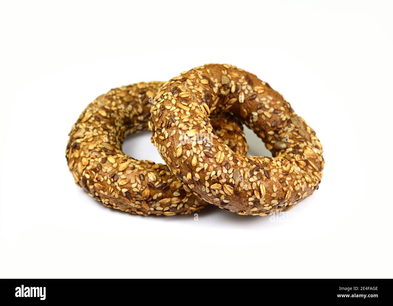 Fullgrain bagel with seeds isolated on white background. Fresh ...