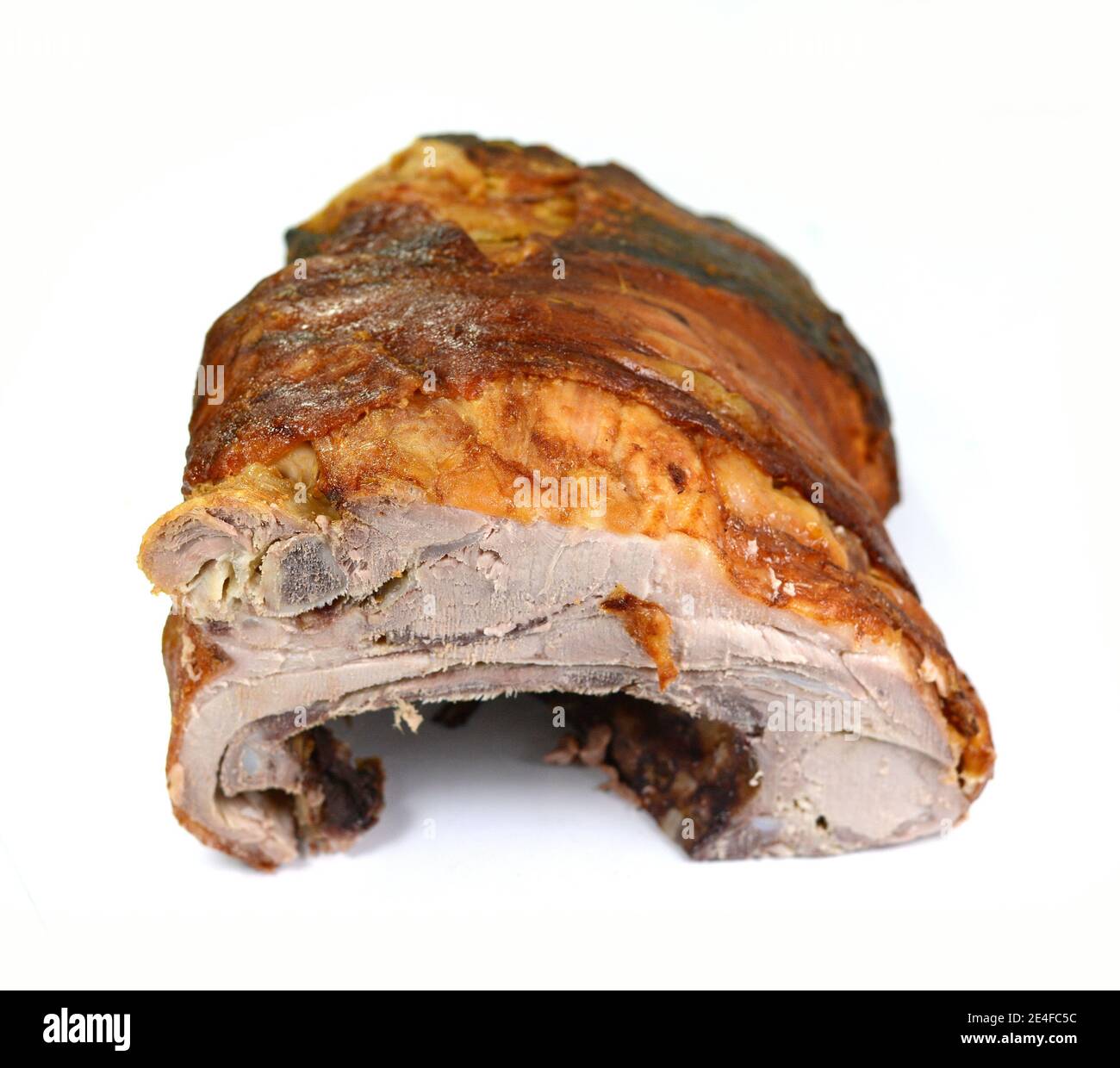 slow roasted young pork shoulder and ribs isolated on white background ...