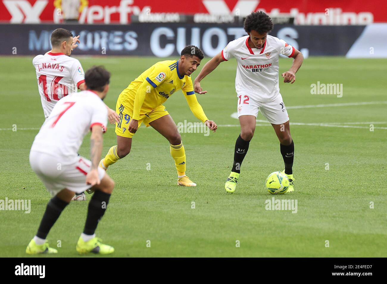 Sevilla FC's Jules Kounde (r) and Cadiz CF's Anthony El Choco Lozano during La Liga match ...