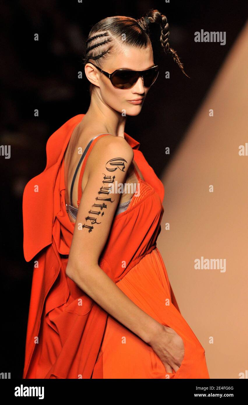 A model displays a creation by designer Jean-Paul Gaultier for his ...