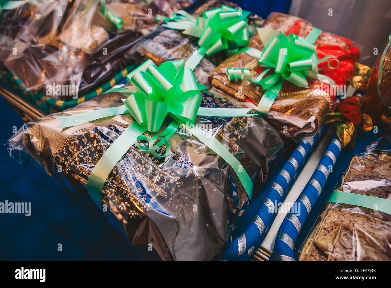 Close up covered in transparent plastic gift present clothes saree ...