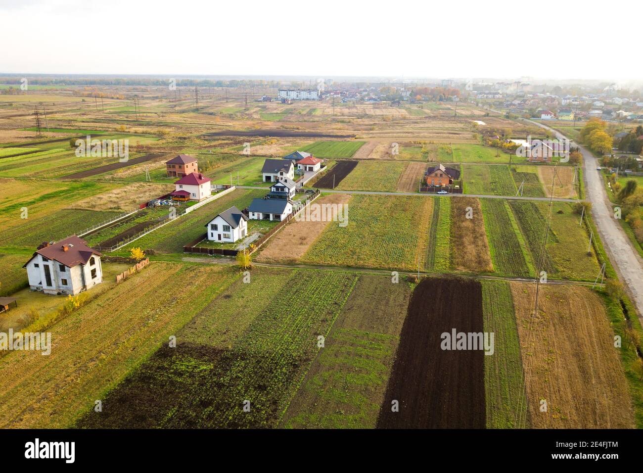 Flying over village residential neighbourhood hi-res stock photography ...