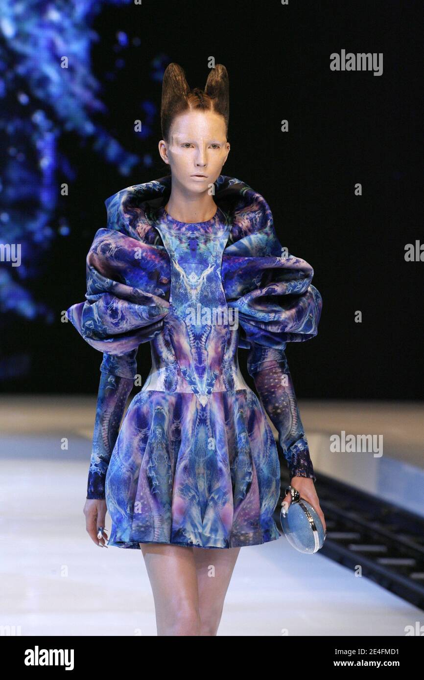 A model displays a creation by Alexander McQueen for his Spring-Summer ...