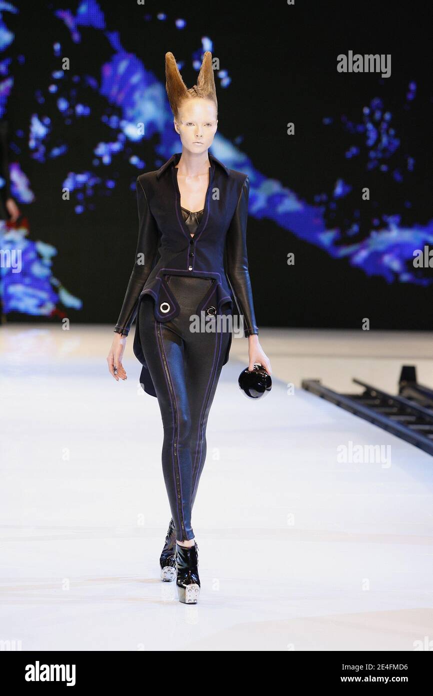 A model displays a creation by Alexander McQueen for his Spring-Summer ...