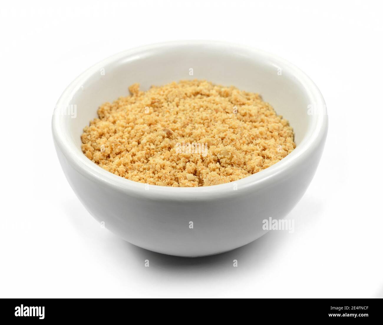 Peanut Butter Powder in a Bowl on a White Background. Ground peanuts ...