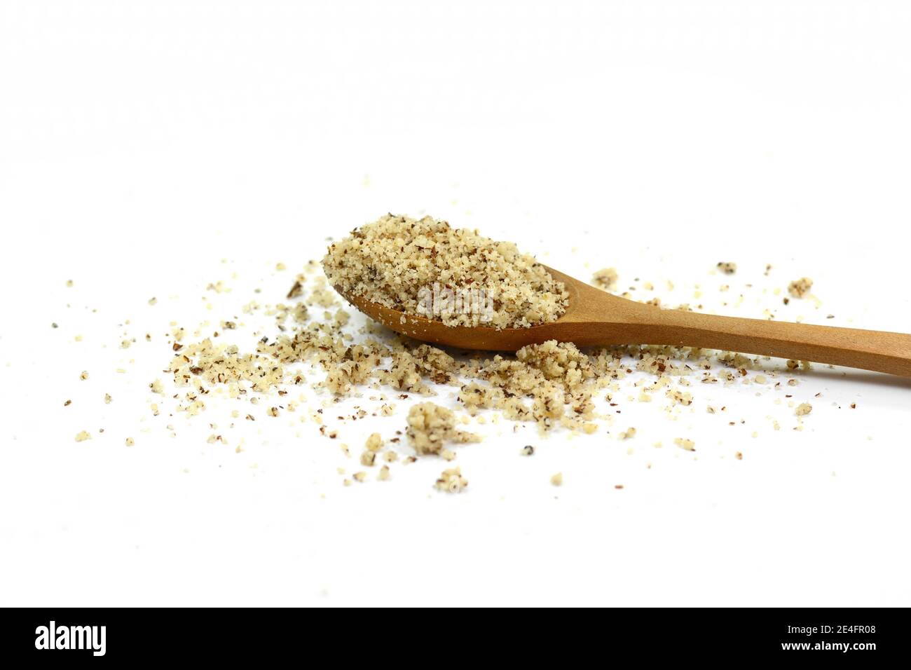 Ground walnuts powder on white. Chopped walnuts pile isolated on white ...