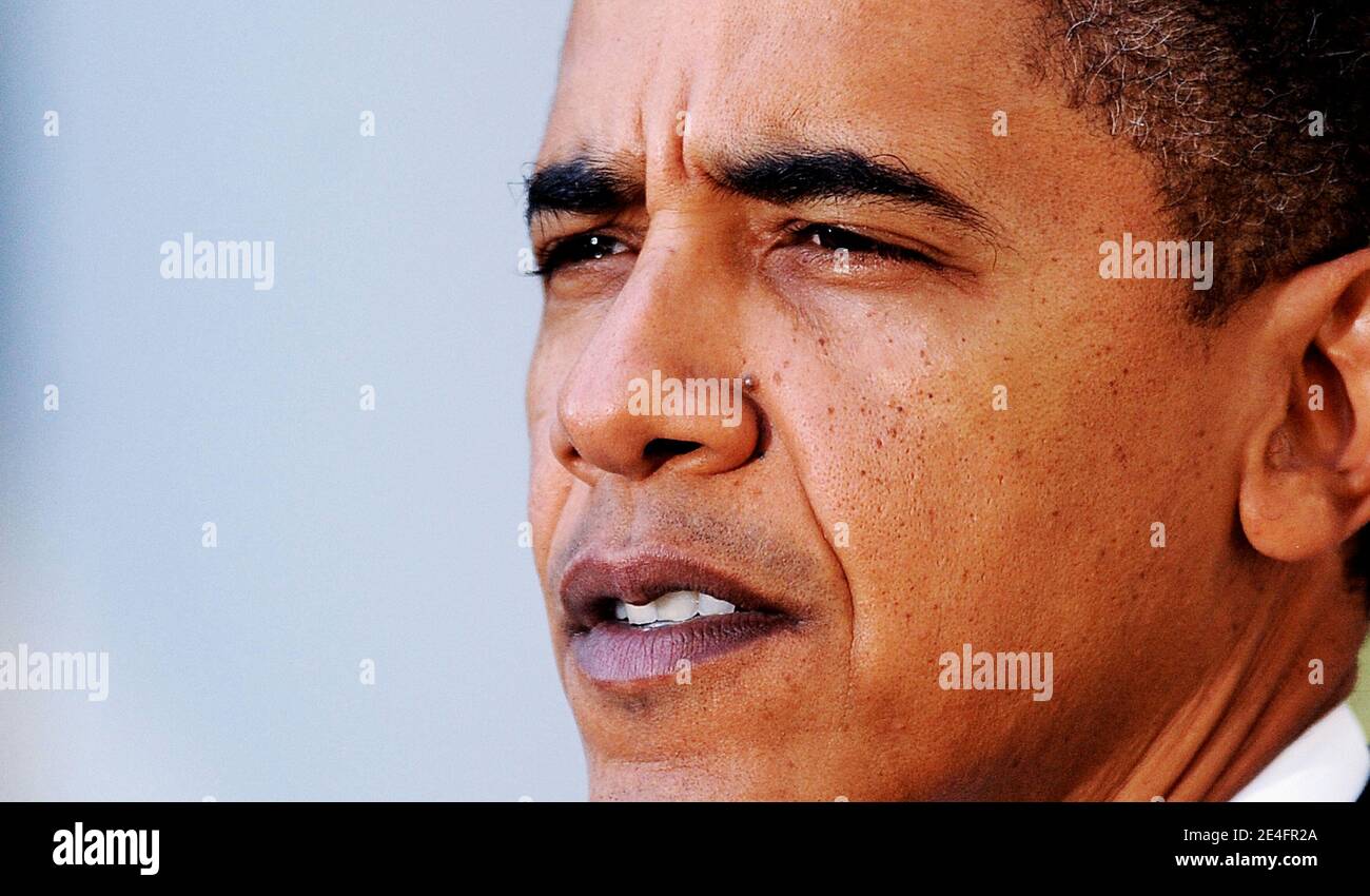 President Barack Obama looks on at a press conference in the Rose ...