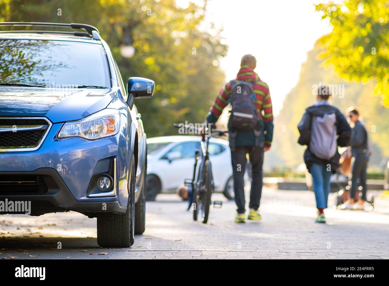 New clean car parked on a city street side Stock Photo - Alamy
