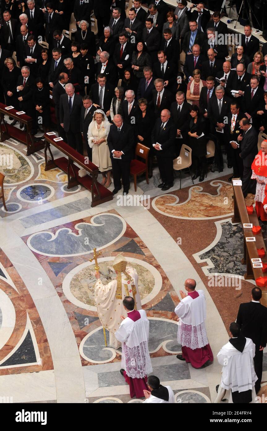 Belgium's Queen Paola and King Albert II look at Pope Benedict XVI as ...