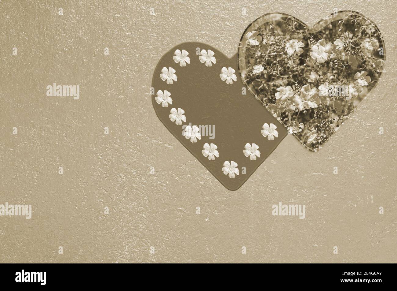 Wooden background with hearts and flowers tinted with sepia Stock Photo ...