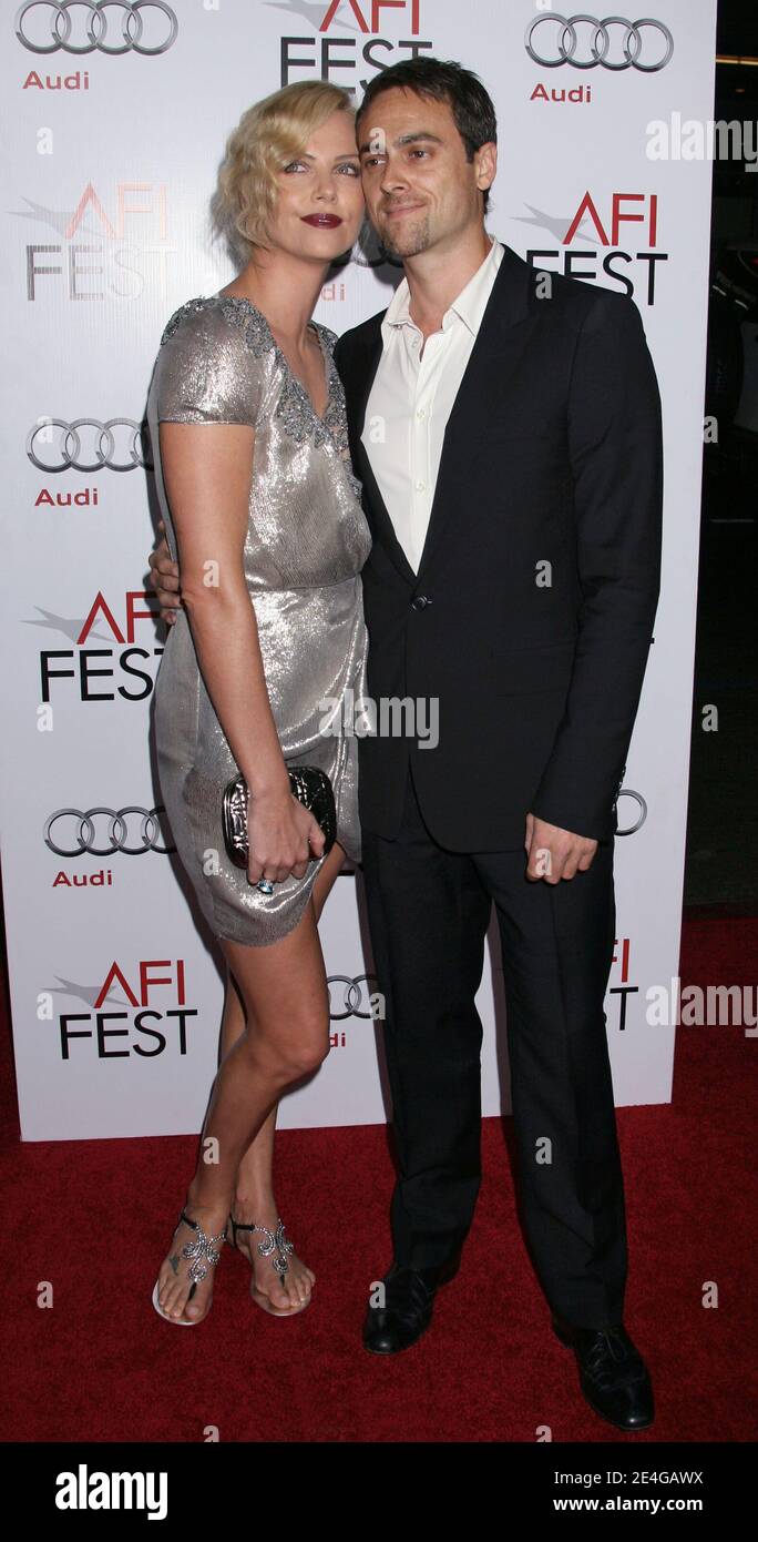 Charlize Theron and boyfriend Stewart Townsend arriving for the ...