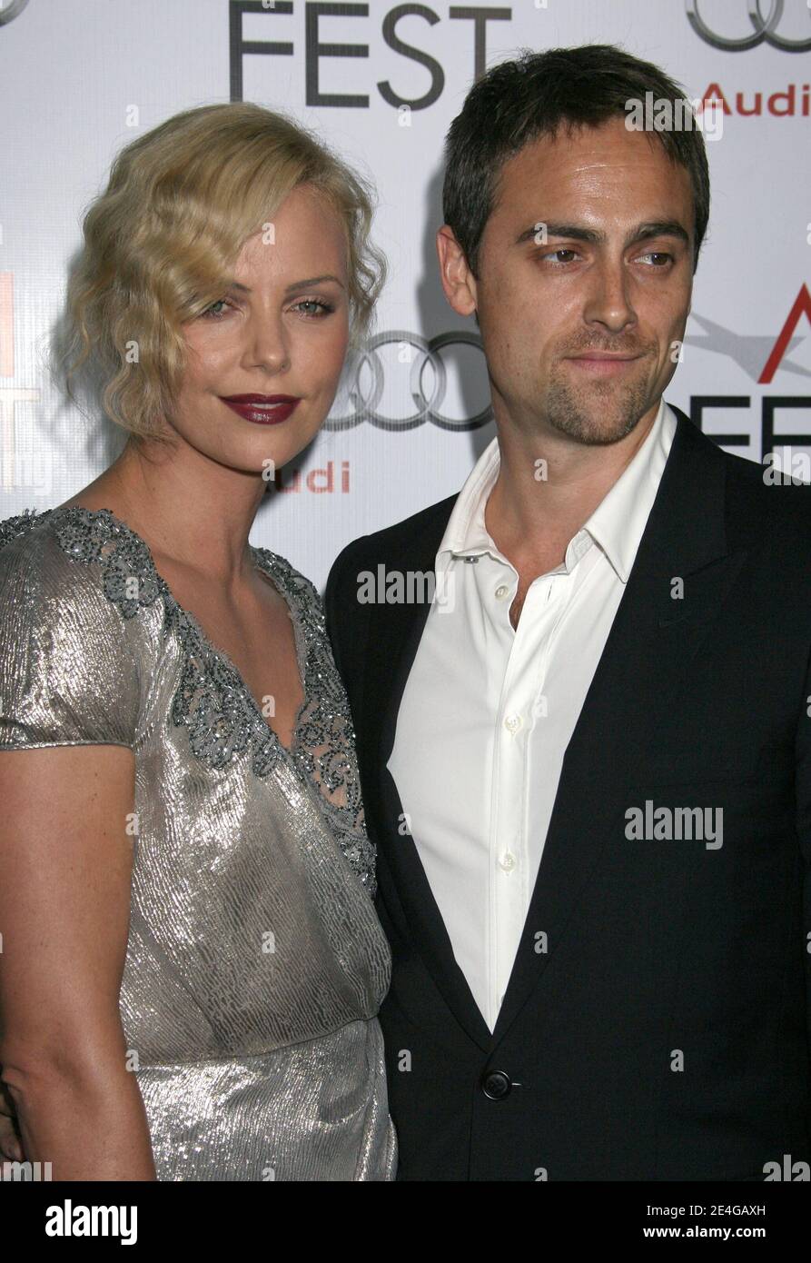 Charlize Theron and boyfriend Stewart Townsend arriving for the ...