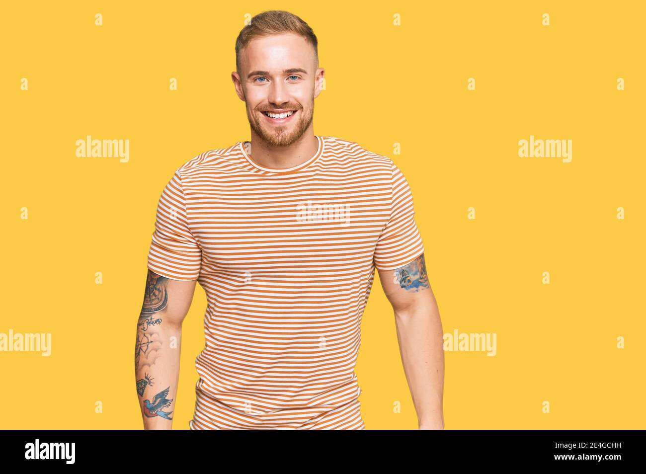 Young irish man wearing casual clothes looking positive and happy ...
