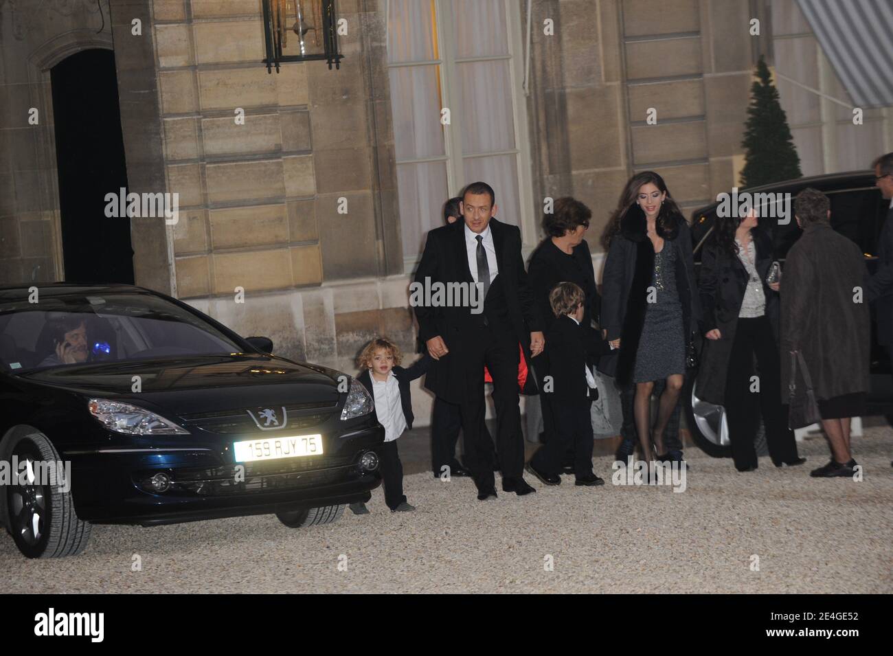 French Actor Dany Boon with his wife Yael and their son arrive at the ...