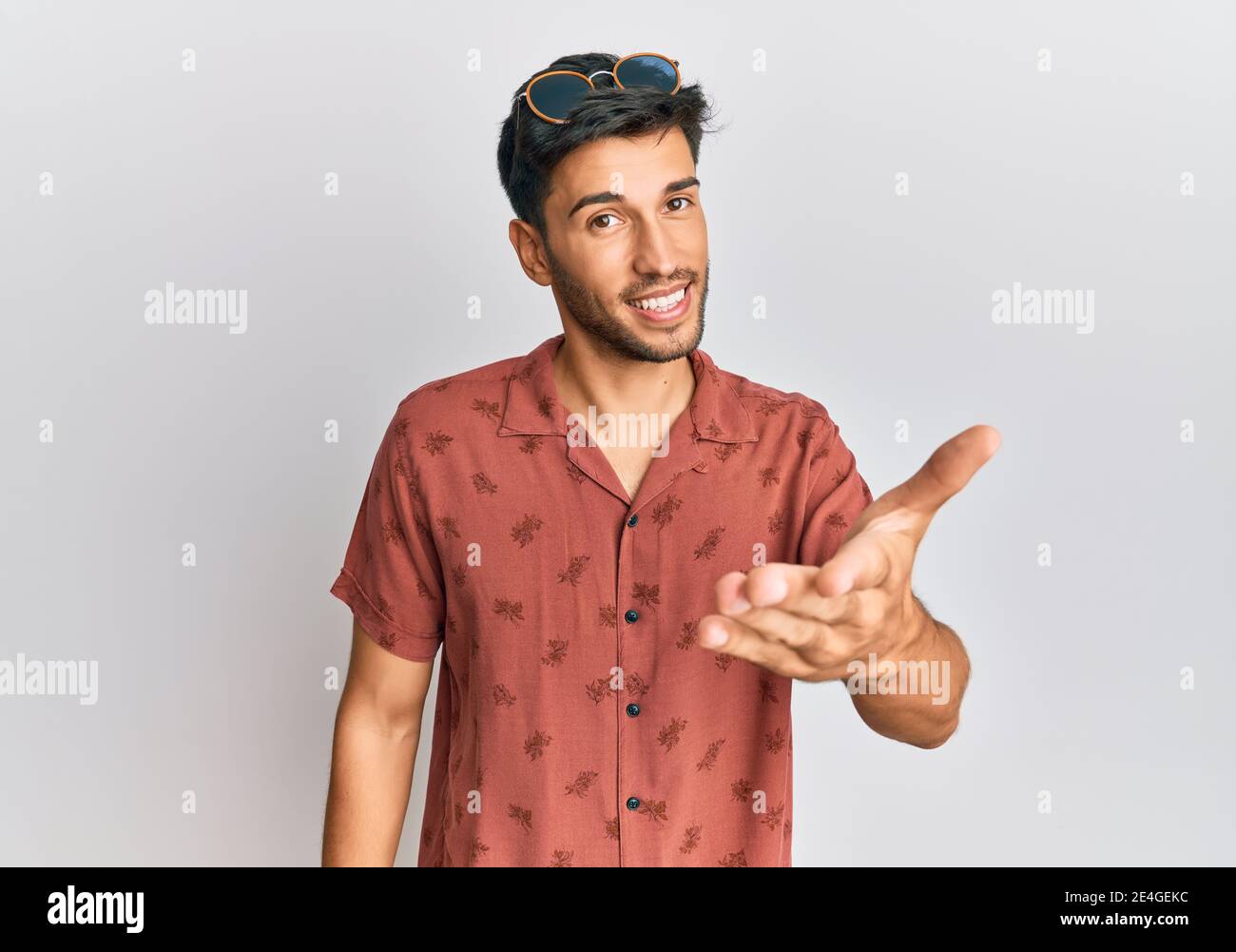 Young handsome man wearing casual summer clothes smiling cheerful ...