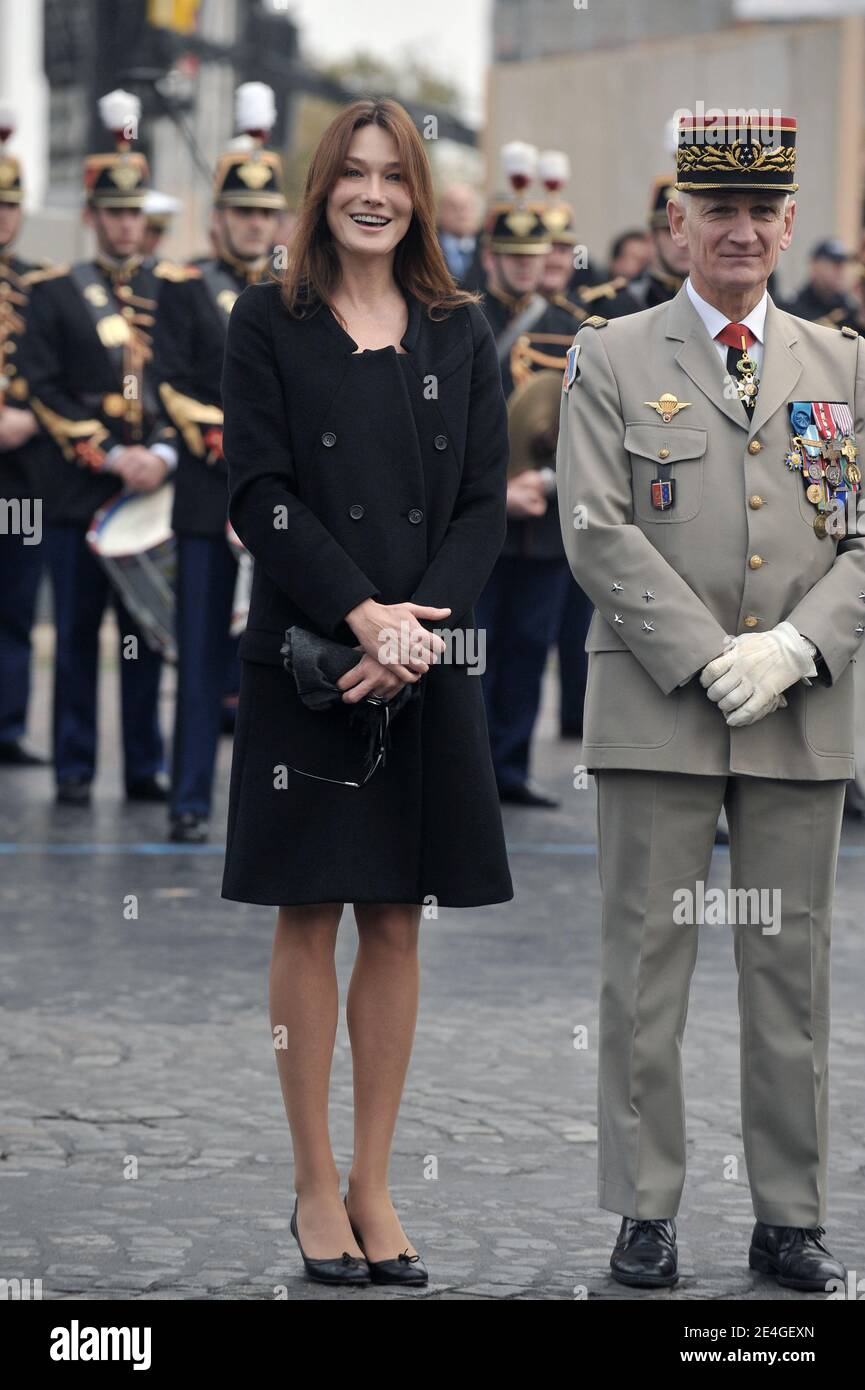 French First Lady Carla Bruni-Sarkozy and French army General Bruno ...