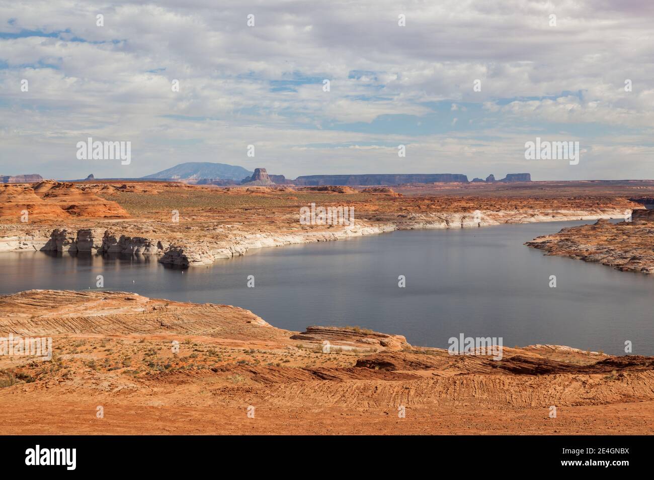 Lake Powell with a receding water level surrounded by desert landscape ...