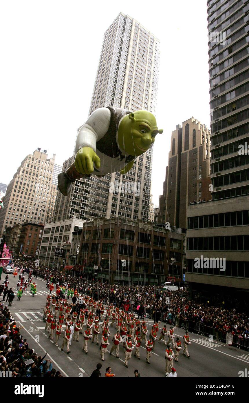 Crowds watch the Shrek balloon during the 83rd Annual Macy's ...