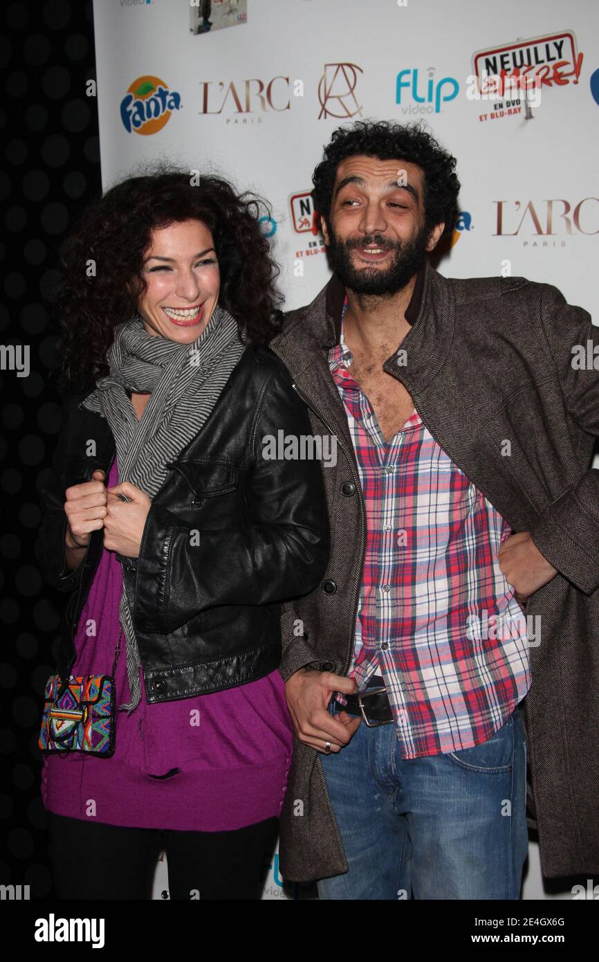 Anne Depetrini and Ramzy Bedia arriving at the party to celebrate 2.5 ...
