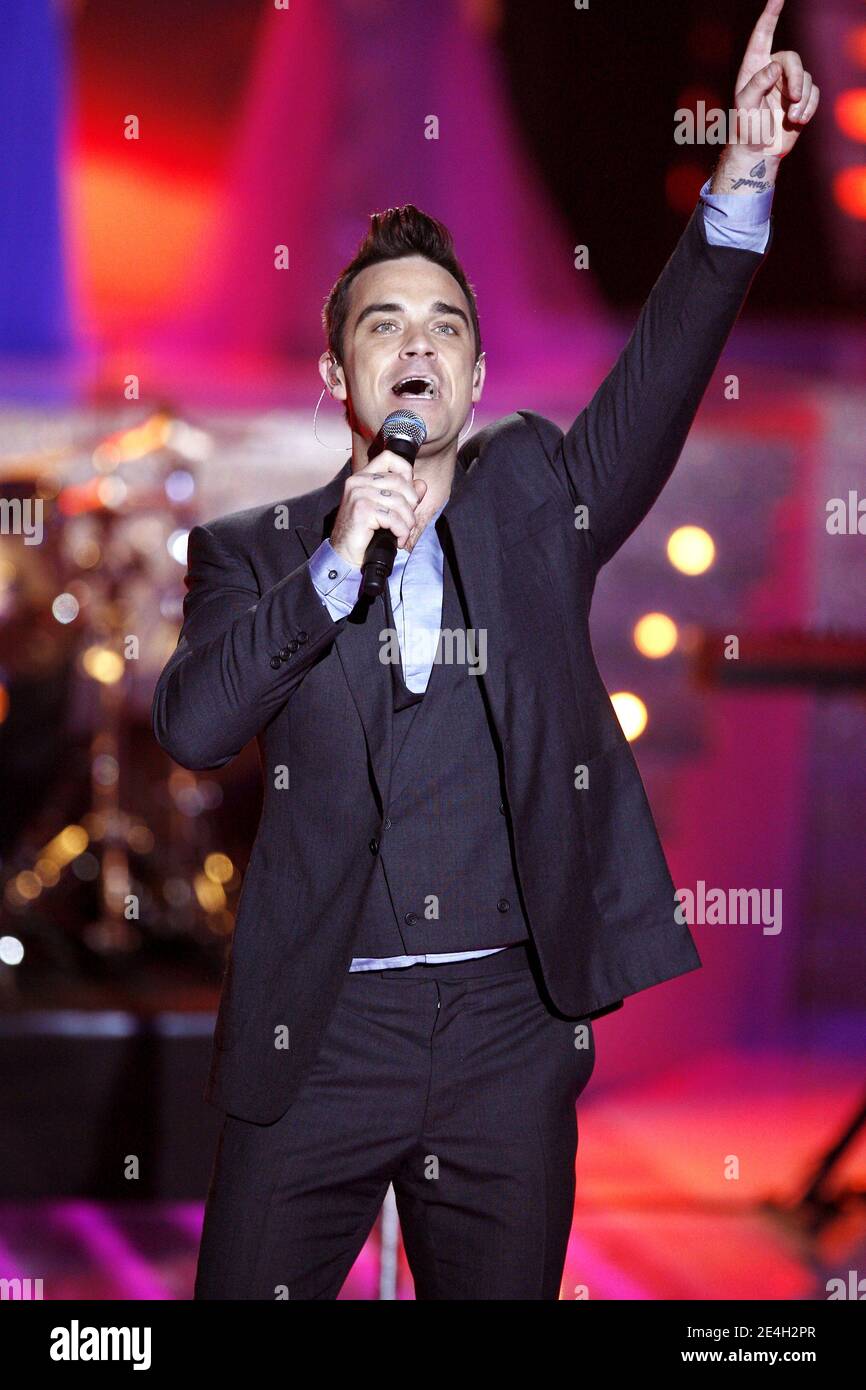 Robbie Williams performs during the Miss France Beauty pageant 2010 at ...