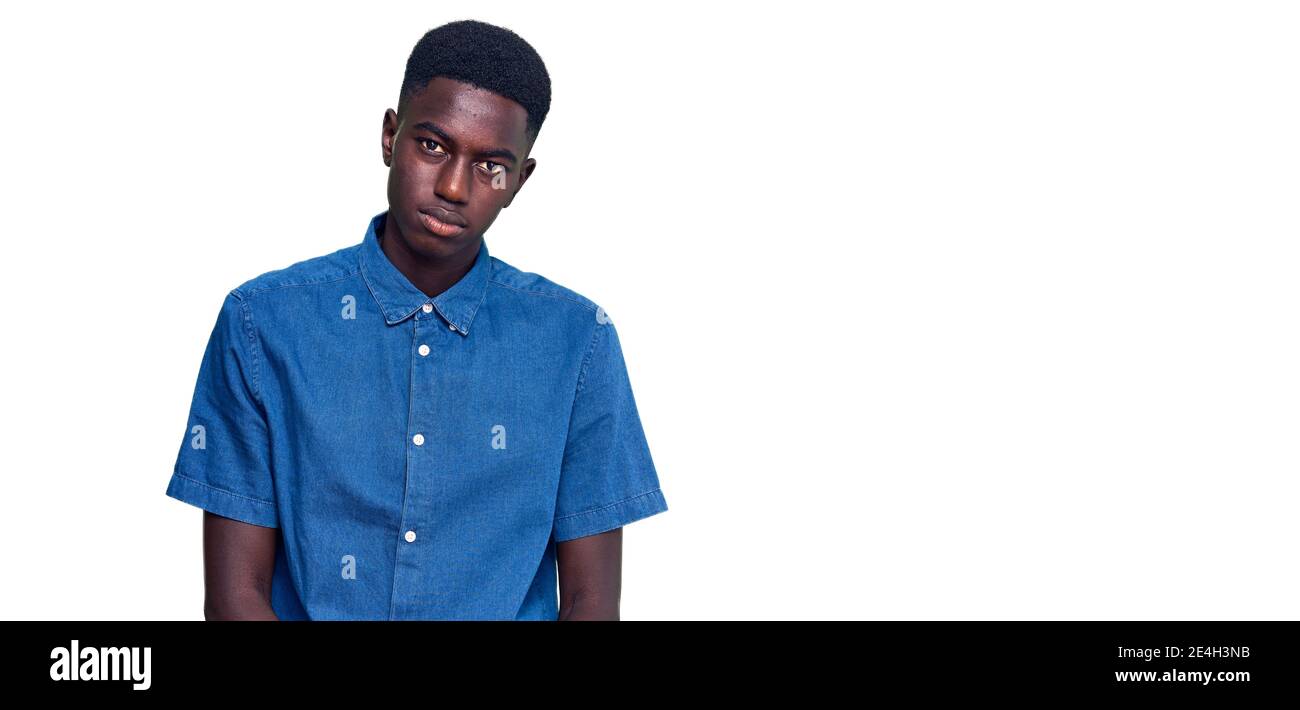 Young african american man wearing casual clothes depressed and worry ...